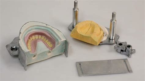 The JIGFLASK Is A Denture Processing Flask Comprising An Arch Shaped