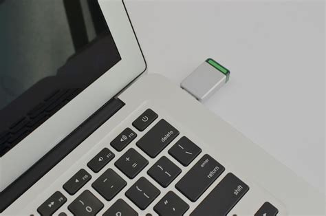Premium Photo Featured Technology Concept Usb Stick Inserted Into The Laptop An Efficient And
