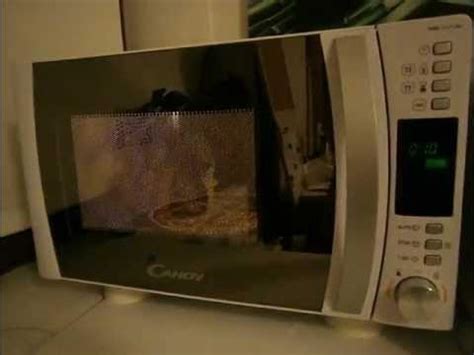 Candy CMW 7117 DW microwave - YouTube