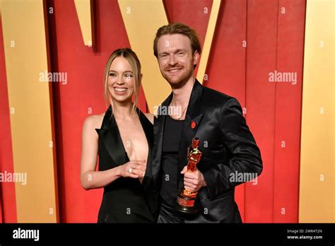 Claudia Sulewski Left And Finneas Oconnell Arrive At The Vanity Fair