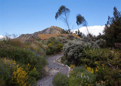High Altitude Viewpoint Perches Over A Volcanic Crater Lake