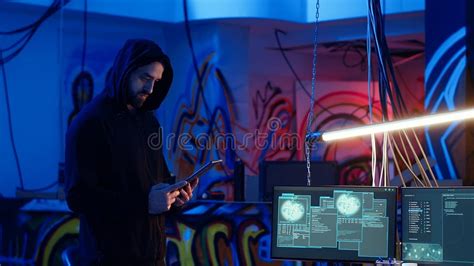 Lone Wolf Hacker In Hideout Trying To Avoid Being Detected Using