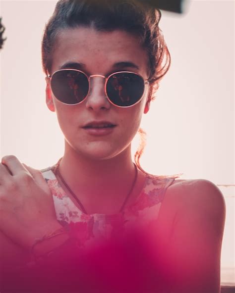 Premium Photo | Close-up of young woman wearing sunglasses