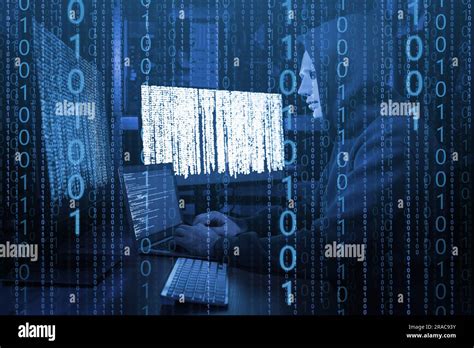 Anonymous Man In Mask With Computers And Binary Code In Darkness Stock Photo Alamy