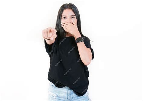 Premium Photo Girl Laughing At You Pointing At The Camera Isolated Young Woman Mocking And