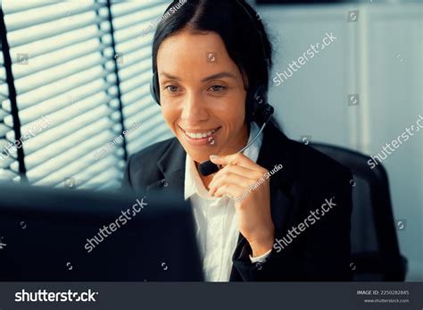 Competent Female Operator Working On Computer Stock Photo 2250282845 Shutterstock