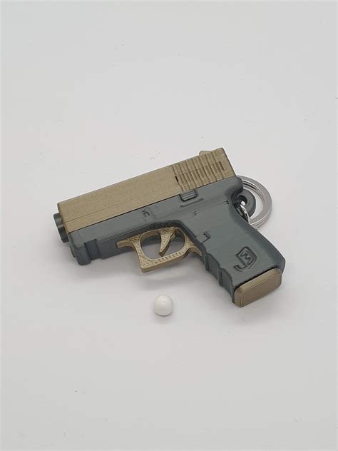 glock keychain — functional blaster toy 3d model by jaatinen3d on thangs