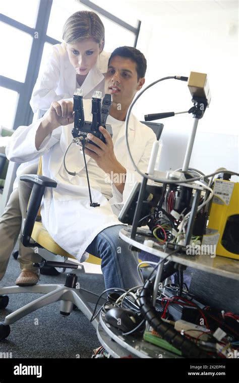 Humanoid Robot For Automotive Assembly Tasks In Collaboration With People And And Lwr Robot