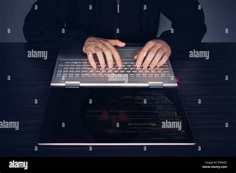 Hacker Using Laptop Lots Of Digits On The Computer Screen Modern Slim Ultrabook Transformer On