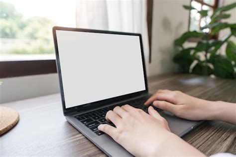 Premium Photo Woman Hands Typing On The Laptop With Empty Blank White