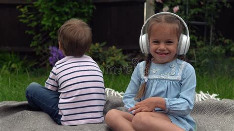 Two Naughty Siblings Dont Share Boy Ans Girl Listening To Music On