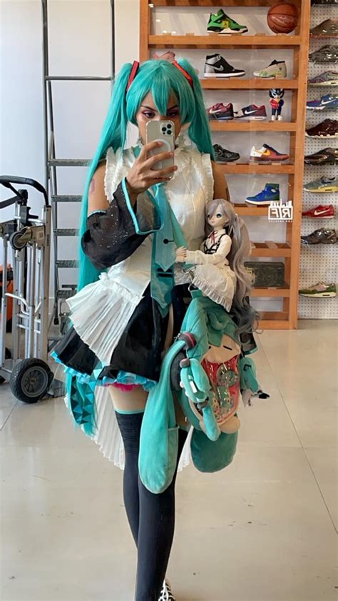 Just Miku With Their Mini Miku Sitting On A Miku Ita Bag Rvocaloid