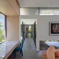 Tall Acoustic Wall Buffers Noise At Modal Home In Silicon Valley