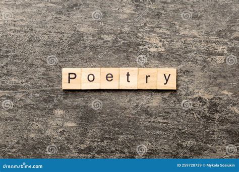 poetry word written on wood block poetry text on cement table for your