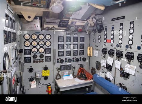 This Photograph Shows A Submarine Control Room Filled With Numerous
