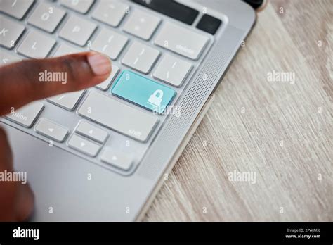 Call It Burglar Bars For Your Data An Unrecognisable Man Using A Keyboard With A Lock Icon On