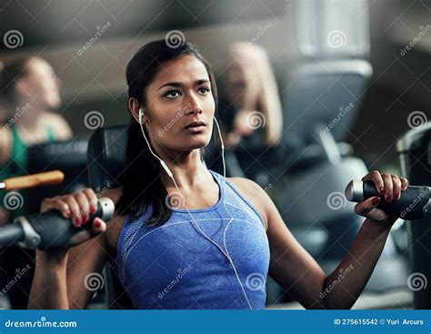 Fit Isnt Given Its Earned A Young Woman Working Out With A Chest
