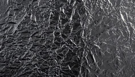 Premium Photo Black Foil Texture Metallic Background