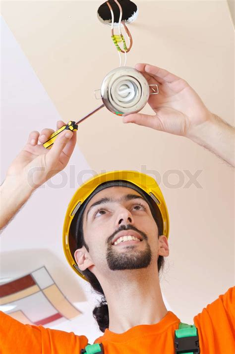 Electrician Working On Cabling Lighting Stock Image Colourbox