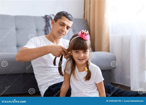 Portrait Of Brunette Young Adult Caucasian Man Posing At Home With His