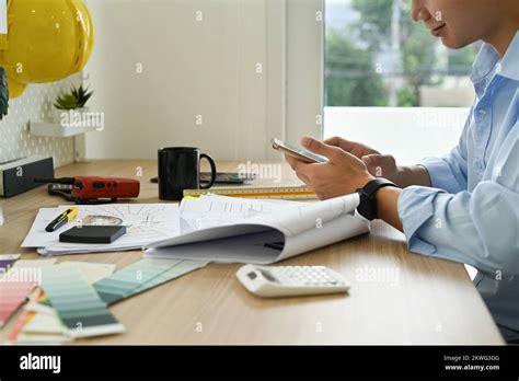 Engineer Or Architect Team Brainstorming Planning Development Details At Construction Office