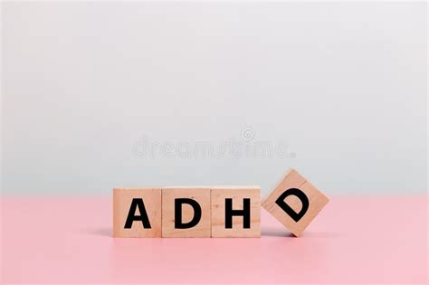 Wood Cube Block Abbreviation Of Adhd On Pink Table Attention Deficit