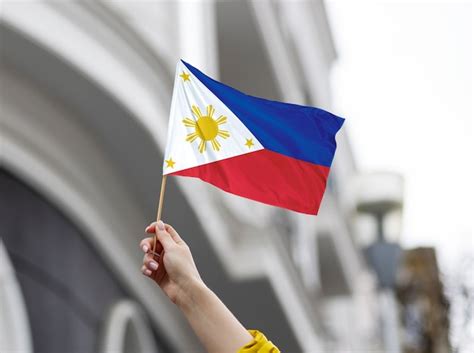 손을 잡고 필리핀 국기 무료 사진