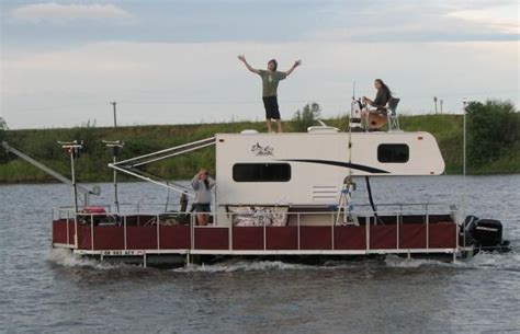 They Used A Floating Dock To Convert This Slide In Camper Into A