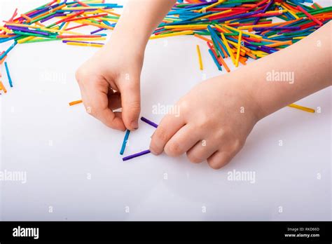 Kid Making Triangle Shape On As Creative Concept Stock Photo Alamy