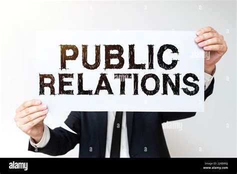 Hand Writing Sign Public Relationspractice Managing Spread Of Information Between Individual