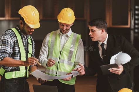 Architect Team Working With Blueprints For Architectural Plan Engineer