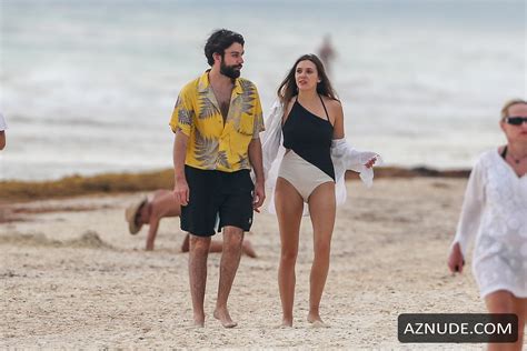 Elizabeth Olsen Sexy In A Black And White Swimsuit With Boyfriend