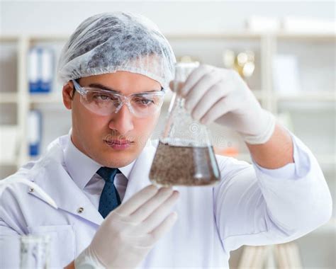 Young Researcher Scientist Doing A Water Test Contamination Expe Stock Image Image Of
