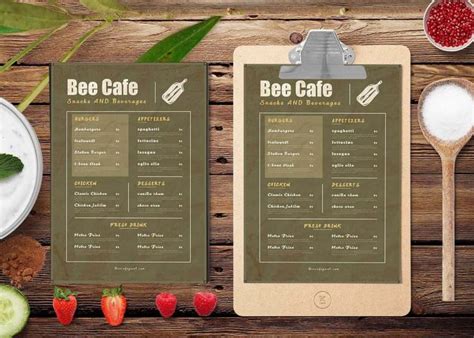 A Menu Is Shown On Top Of A Table With Utensils And Other Food Items A Menu Is Shown On Top Of A Table With Utensils And Other Food Items