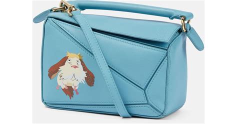 Loewe X Howls Moving Castle Schultertasche Heen Puzzle Small In Blau Lyst De