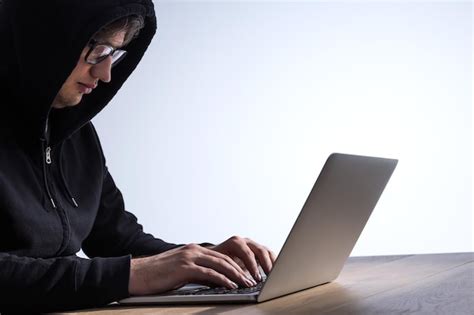 Premium Photo Guy Hacking Computer
