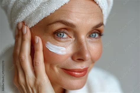 Close Up Photo Of Adult Woman Touching Her Skin She Applies