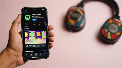 Spotify Music App On The Smartphone App For Music Radio And Podcast Streaming Editorial Stock