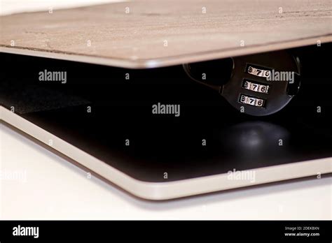 Access To A Personal Computer Protected By A Padlock With A Code