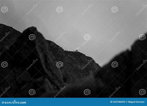 A Light House Is Working Proyecting A Light Beam Into The Fog Stock Image Image Of Cliff