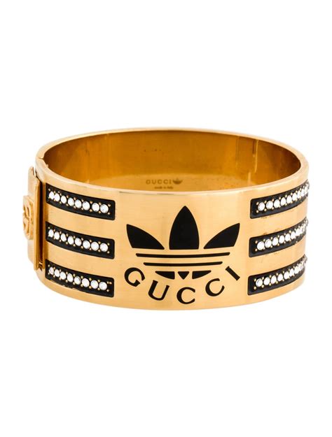Gucci X Adidas Enamel And Crystal Logo Hinged Bangle Bracelet Gold Tone Metal Bangle Bracelets