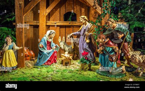 A Traditional Nativity Scene With Figurines Depicting The Birth Of