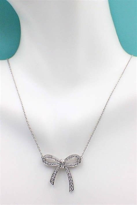 Tiffany And Co Diamond And Platinum Bow Pendant Necklace For Sale At