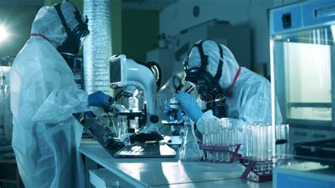 Scientists With Microscope Working In Laboratory Stock Video Video Of