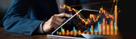 Business Professional Using Tablet To Analyze Interactive Stock Market