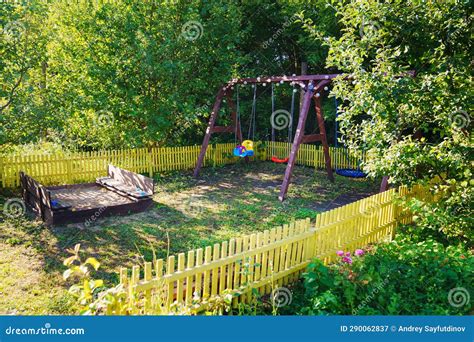 Lawn With Playground In The Garden Sandbox Swings And Benches Stock Image Image Of Festival