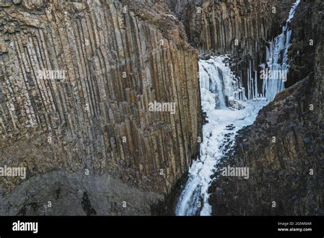 Litlanesfoss Waterfall Frozen With Basalt Columns From Aerial View Stock Photo Alamy