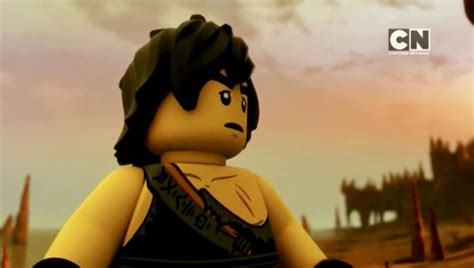 A Lego Character Is Standing In The Desert