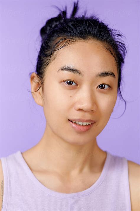 Young Asian Woman No Makeup And Smiling Confident On Face By Stocksy