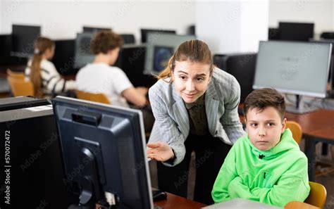 Female Teacher And Her Babe Babe Babe Looking At Monitor Of PC During Computer Science